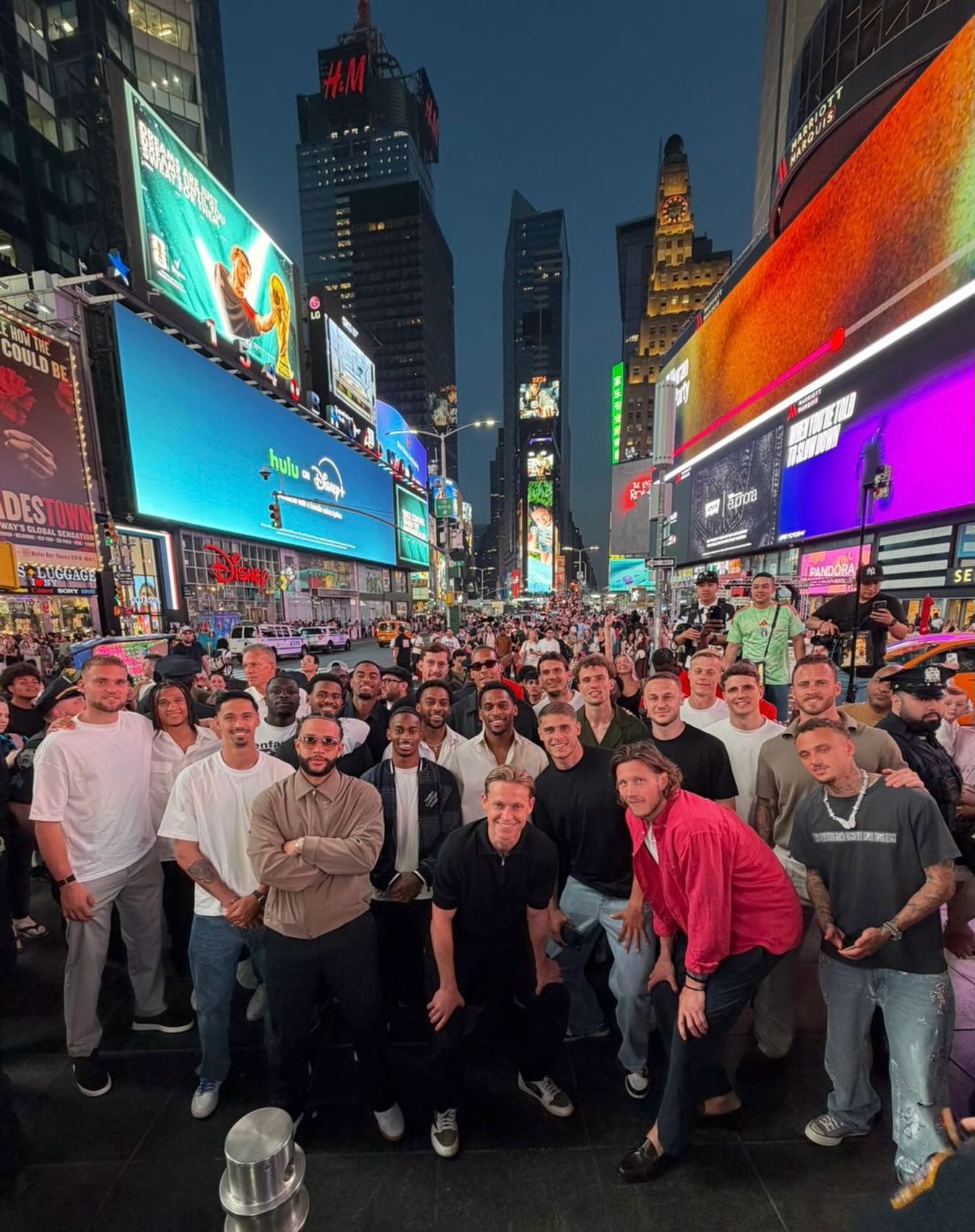 Dutch national football team takes unique group photo on Times Square ...